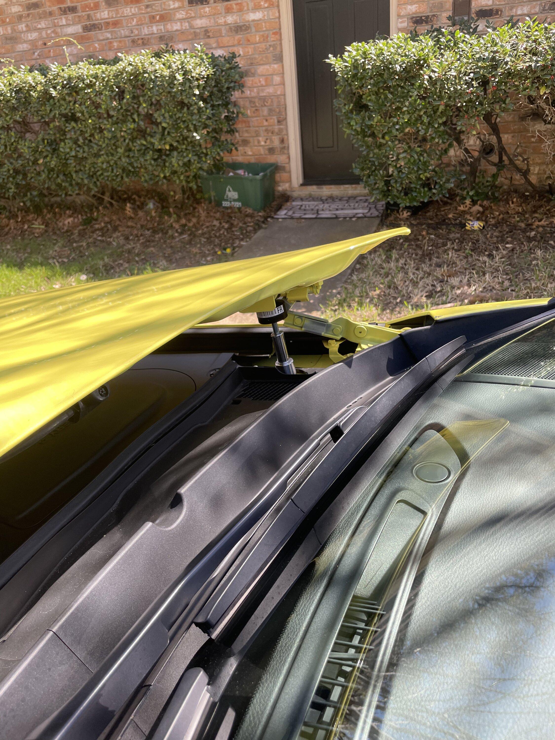 Anyone seen these hood risers & know how to get them down. Spun the Z on wet roads and caught ...